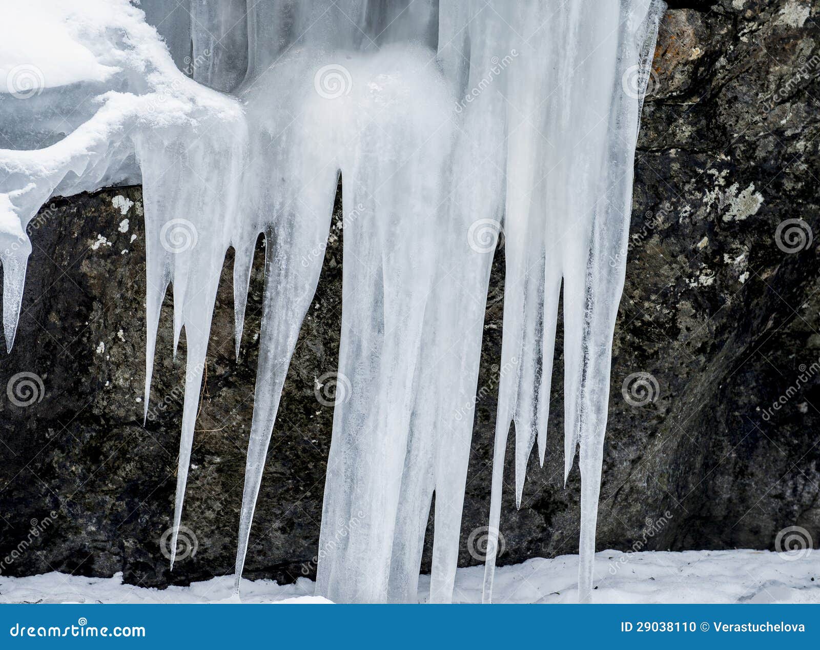 Big icicles on a rock stock photo. Image of season, flake - 29038110