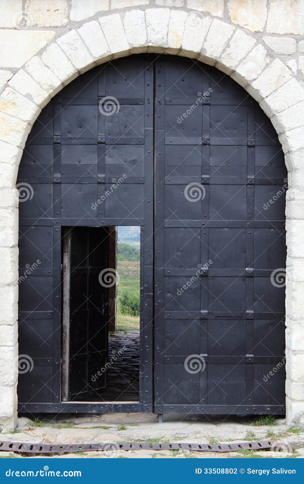 Big Iron Gates in the Castle Stock Photo - Image of brick, construction ...