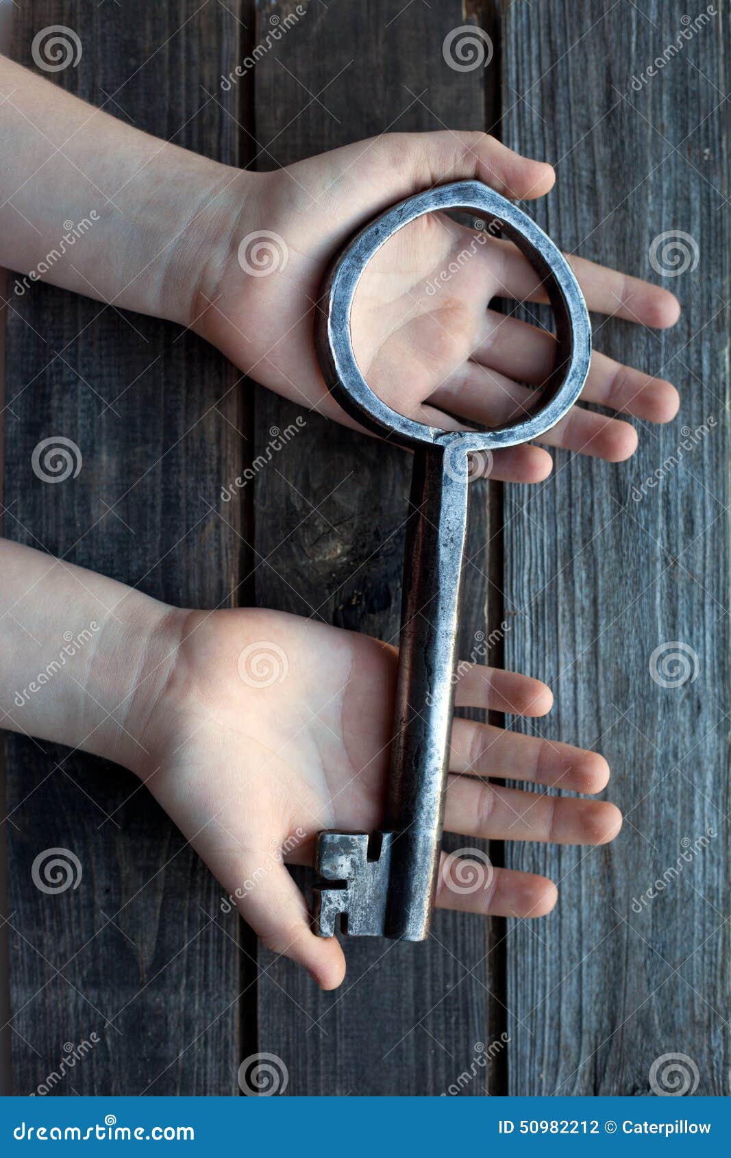 Big key in two hands stock photo. Image of board, code - 50982212