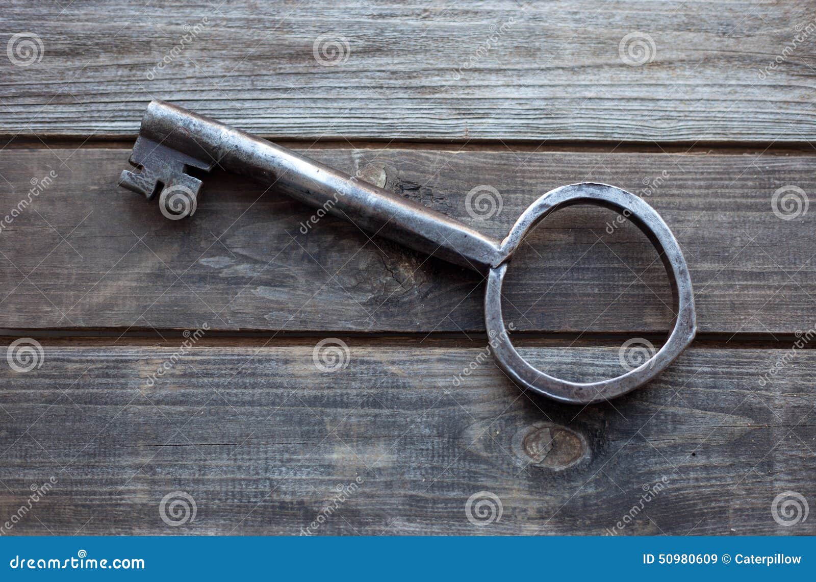Big Key on Wooden Rustic Table Stock Image - Image of iron, floor: 50980609