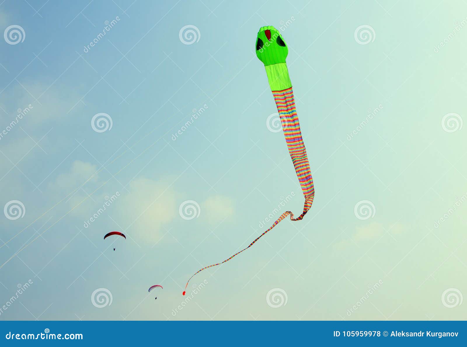 Big Kite Snake Flying Over Blue Sky Stock Photo - Image of paragliding ...