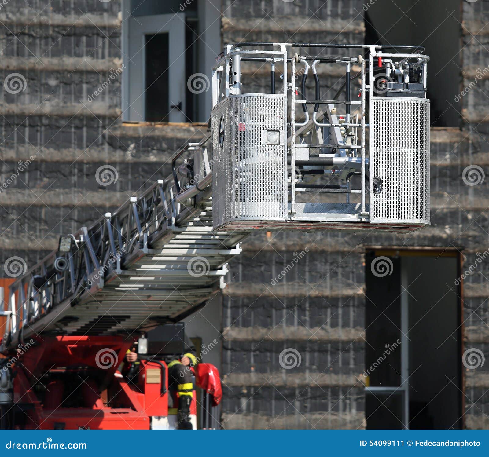 Big Ladder Rack of Firefighters during Exercise in the Firehouse Stock ...
