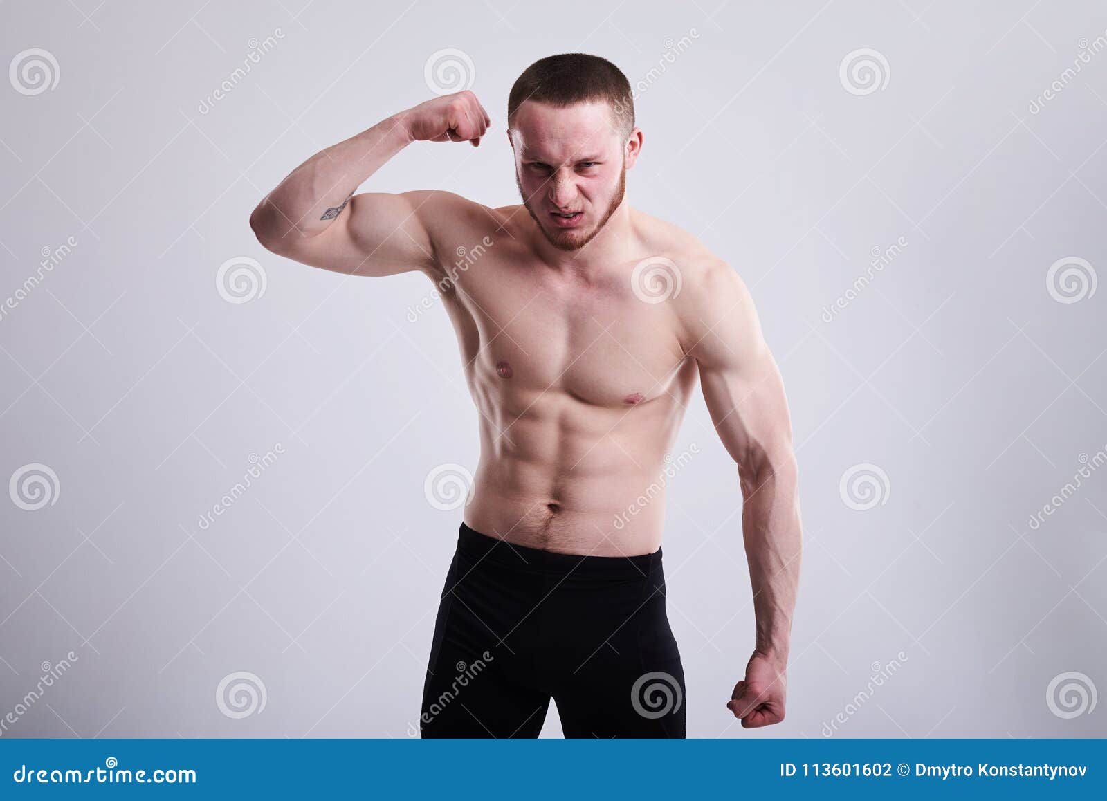 Big man showing his biceps stock photo. Image of muscle - 113601602
