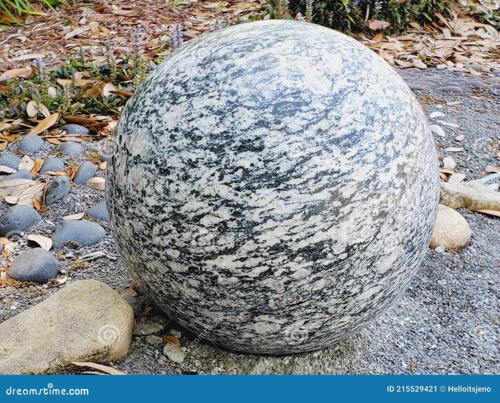 Big Marble Sphere in the Dirt Stock Image - Image of plant, sculpture ...