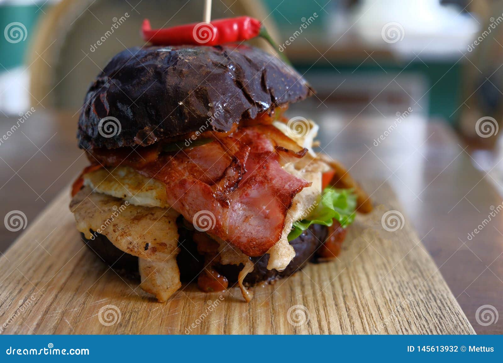 Big Messy Burger Served on Chopping Board Stock Photo - Image of ...