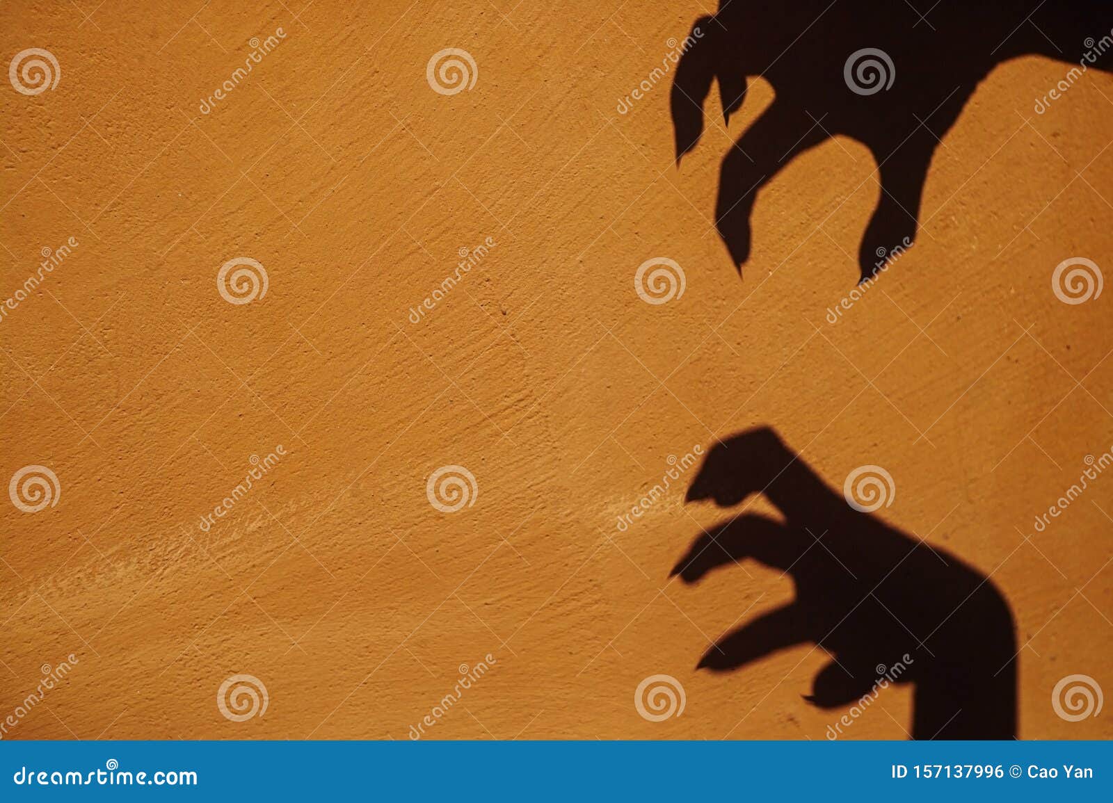 A Big Monster Claw Shadow Hallowween Concept on Wall. Stock Photo ...