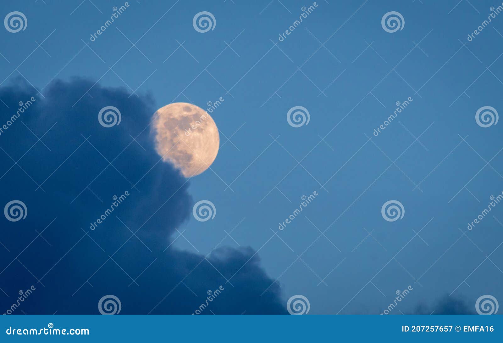 Full Moon Coming Out from Behind Dark Clouds at Twilight, Enniskerry ...