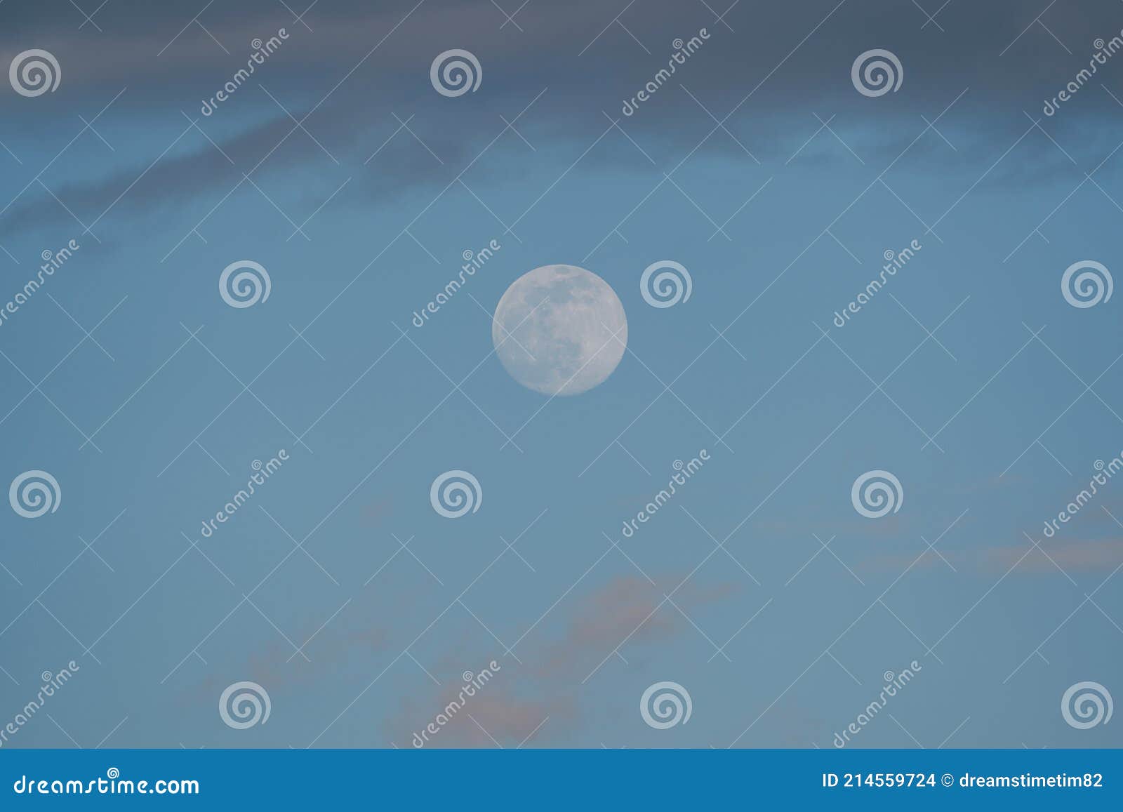 Big Moon with Some Clouds and Blue Sky at the Afternoon Stock Photo ...