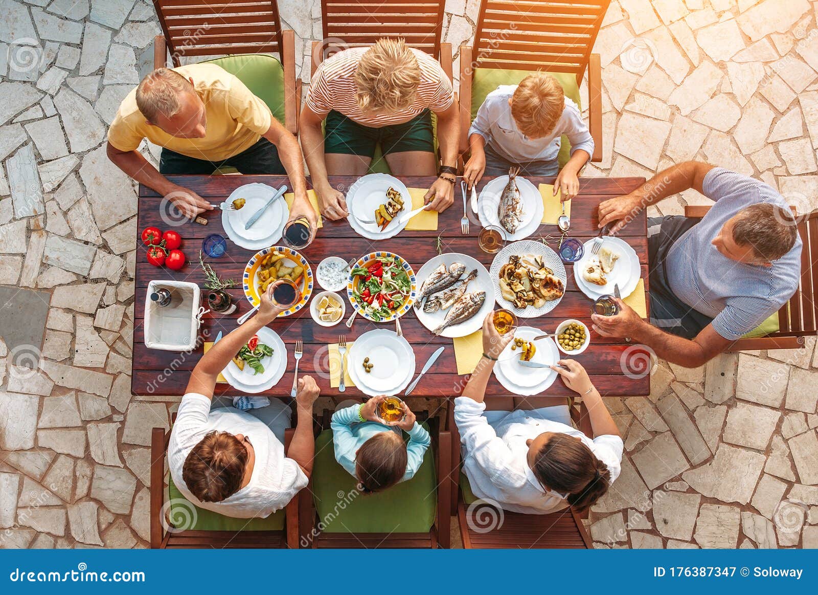 Big Multigenerational Family Dinner in Process. Top View Image on Table ...