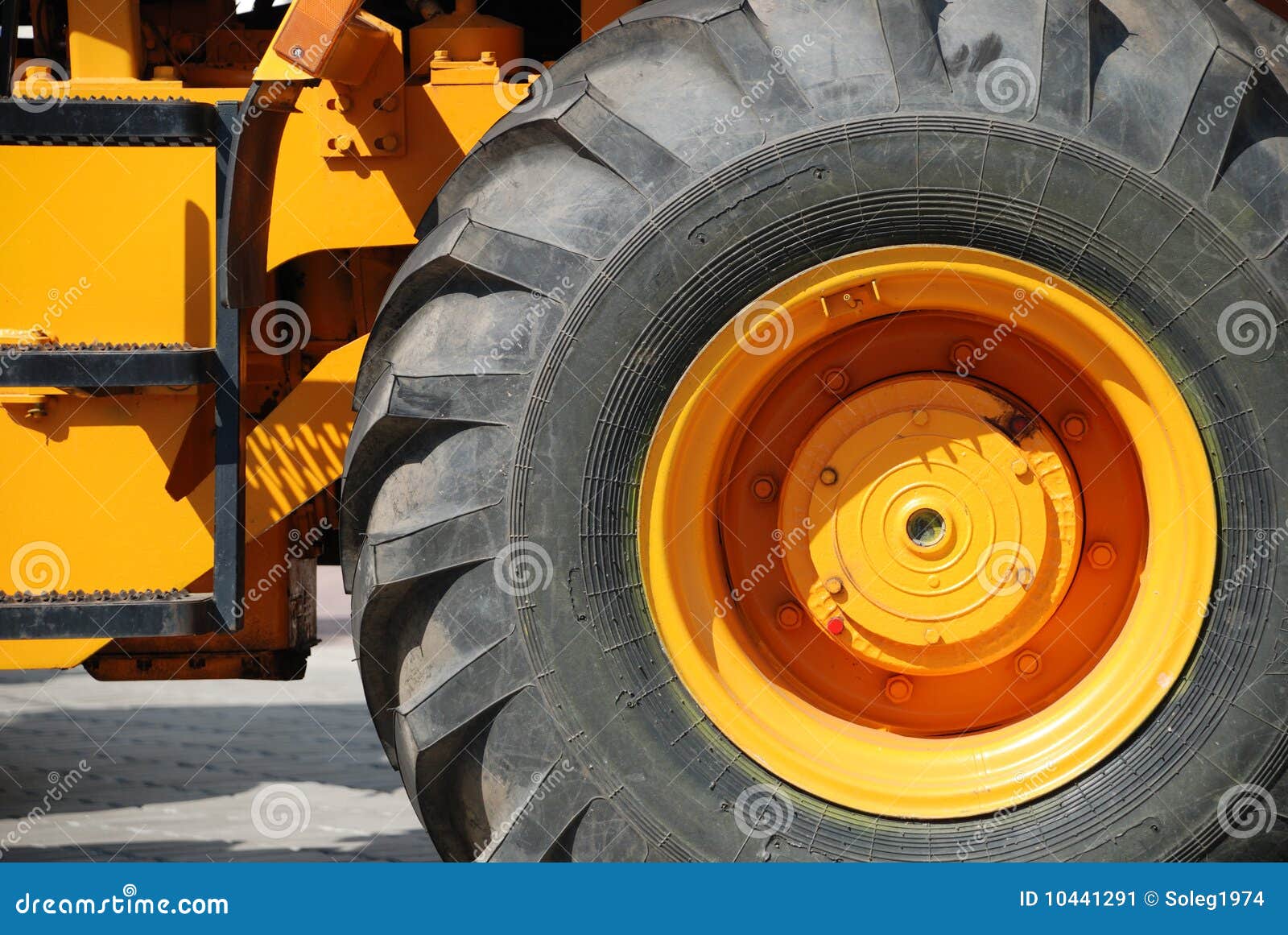 The big new yellow wheel stock image. Image of power - 10441291