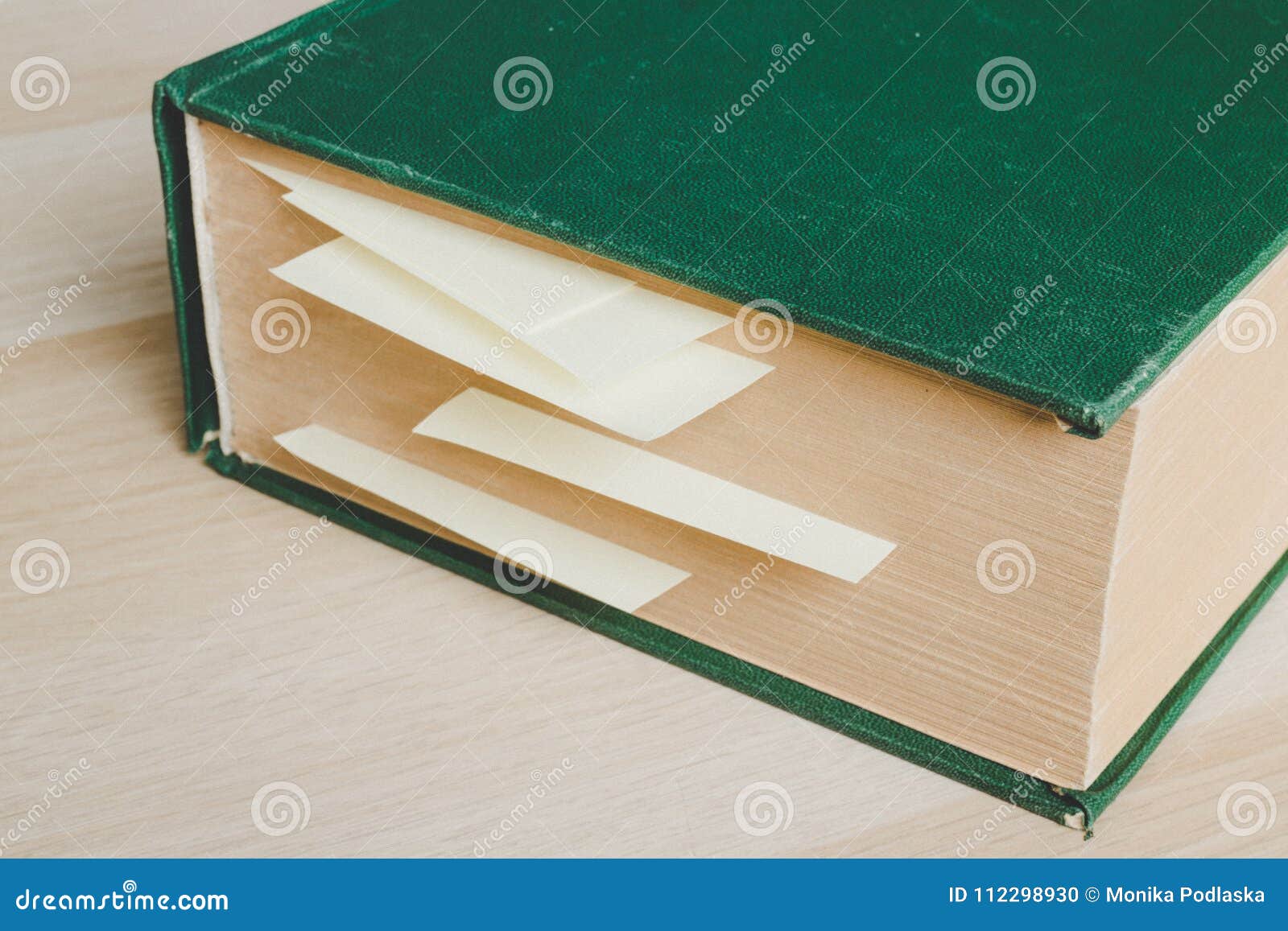 Big Old Book with Tag Pages by Yellow Sticky Notes Stock Photo - Image ...