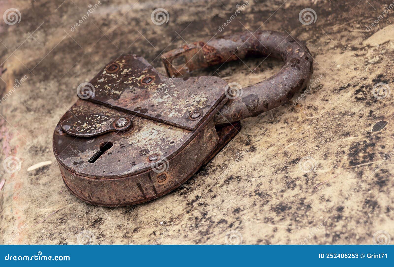 A Big, Old, Rusty, Iron Lock on a Metal Surface. Close-up Stock Image ...
