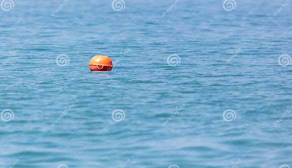 Big Orange Float on the Sea Stock Photo - Image of outdoor, vacation ...