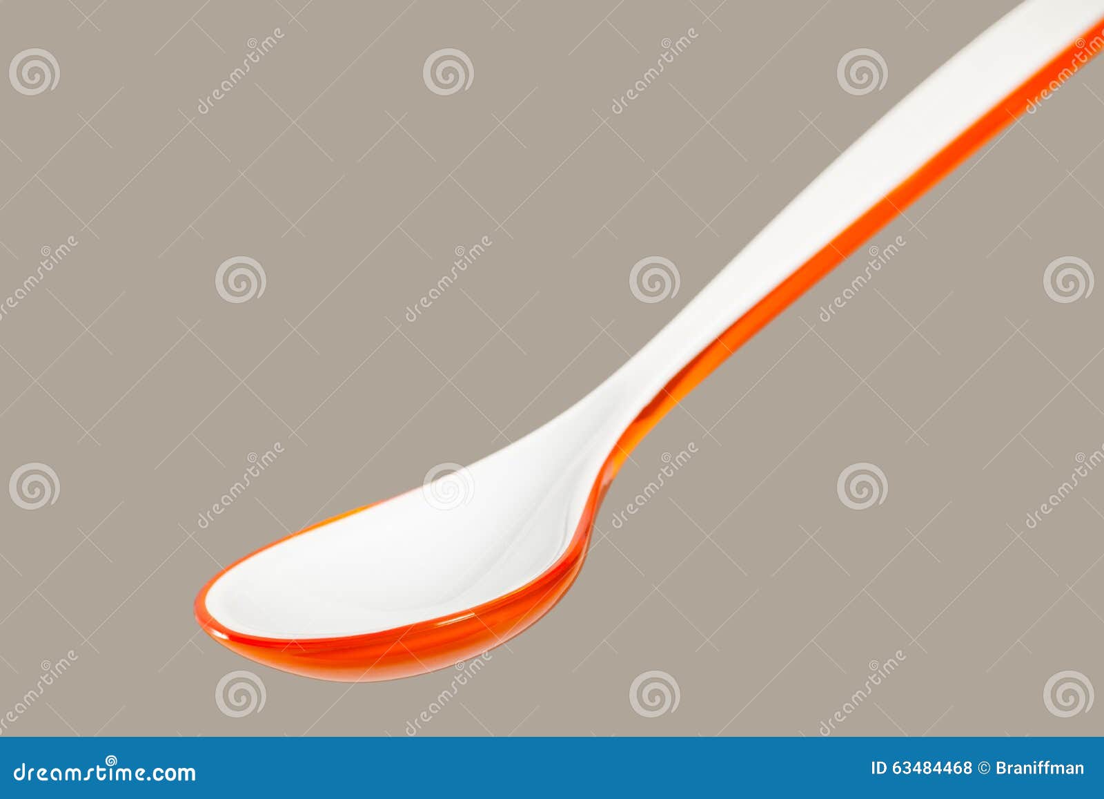 Big orange plastic spoon stock photo. Image of home, spoon - 63484468