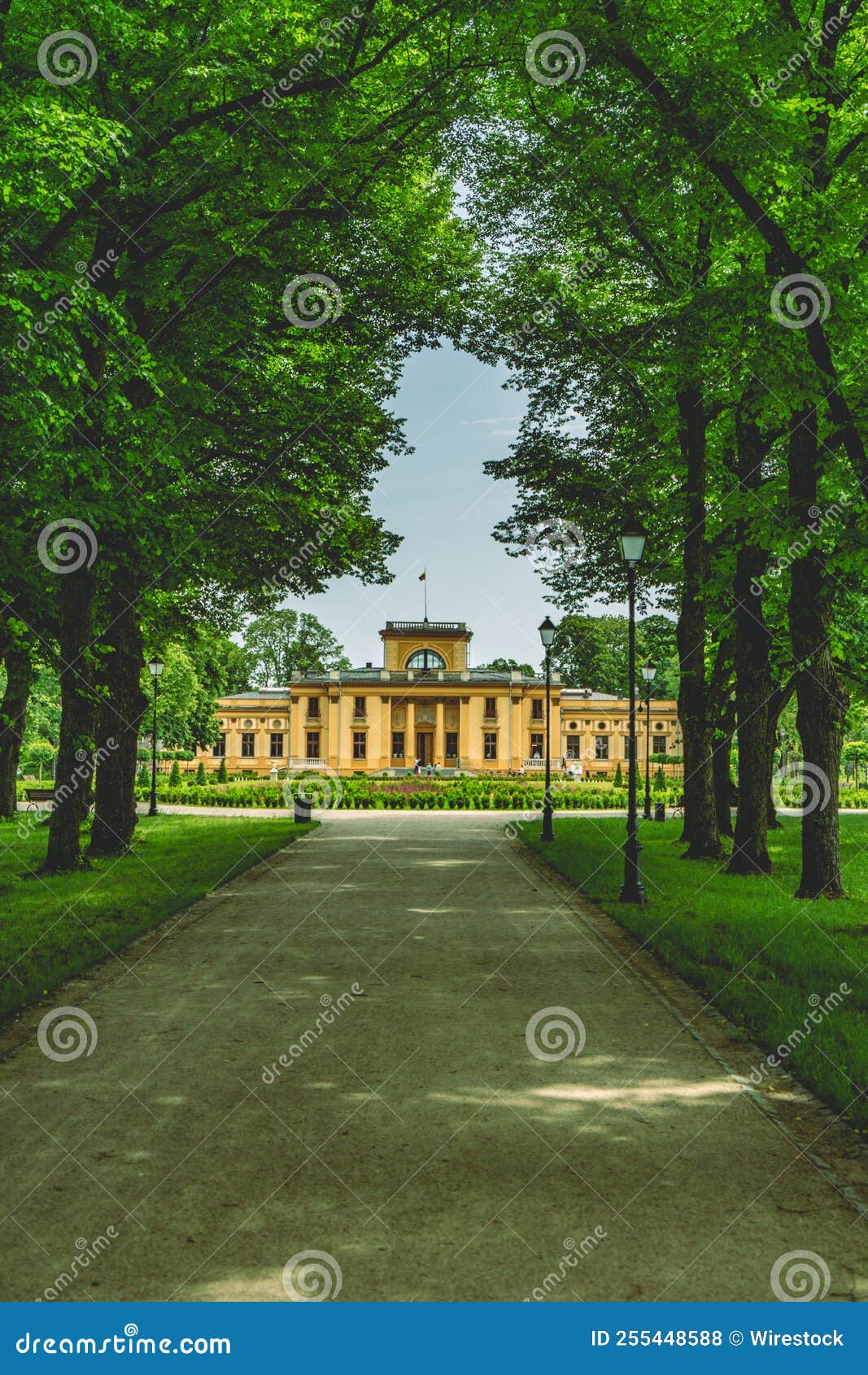 Big Palace with a Pathway Full of Trees and Plants Stock Photo - Image ...