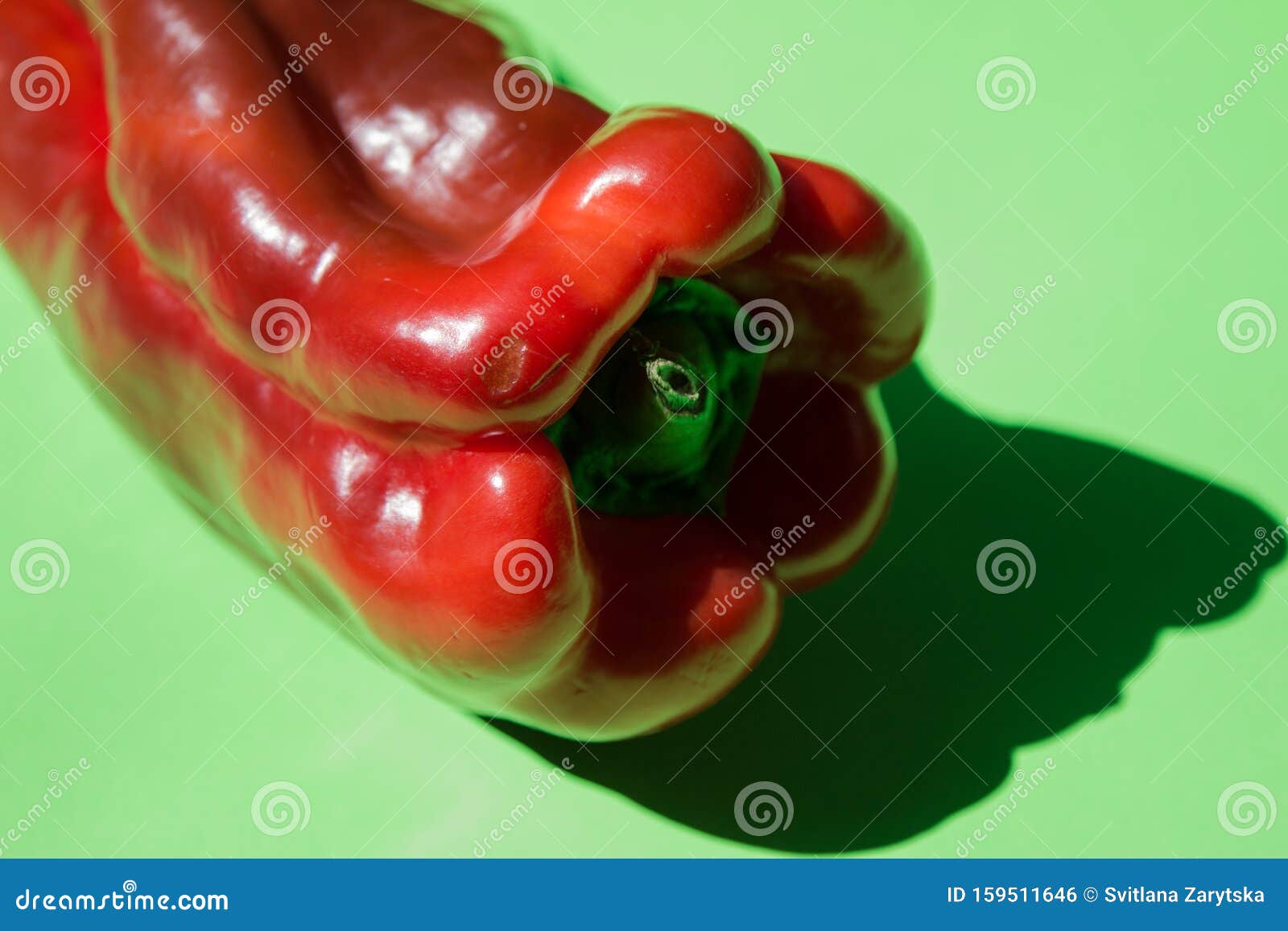 Large Pepper with Shadow on a Green Background Stock Photo - Image of ...