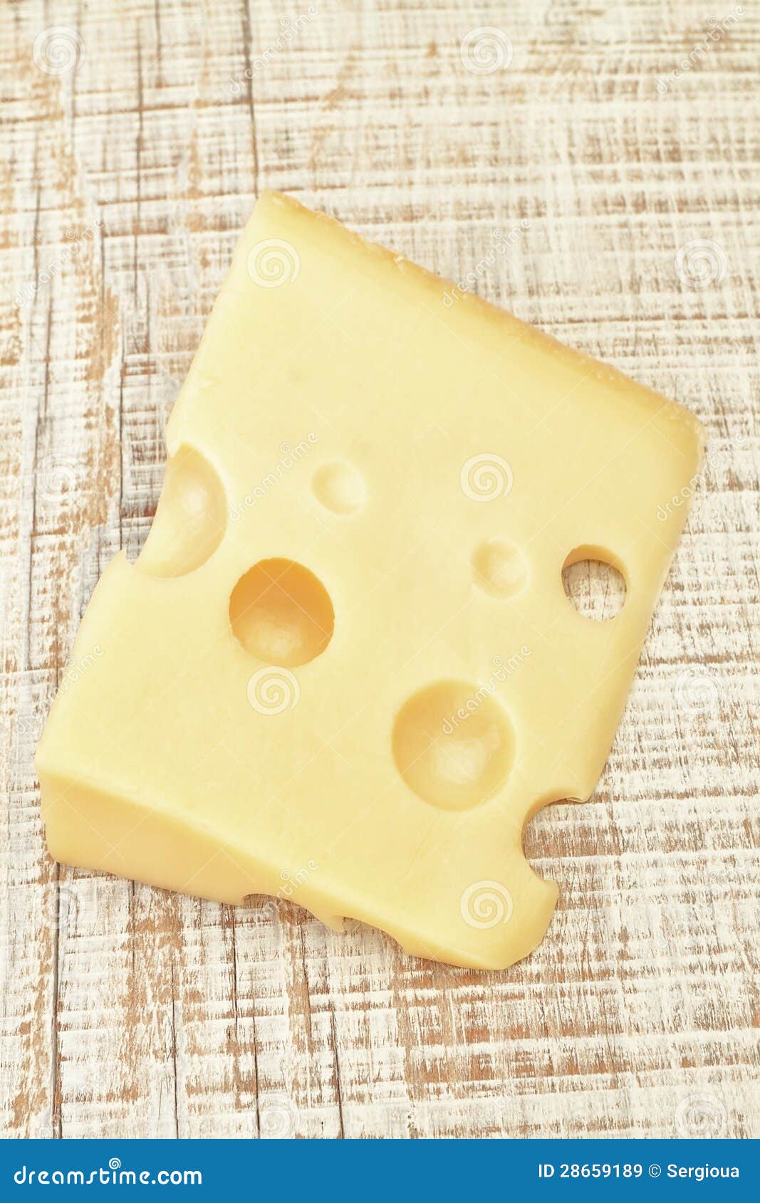 Big Piece of Cheese on a Textured Board. Stock Image - Image of dairy ...