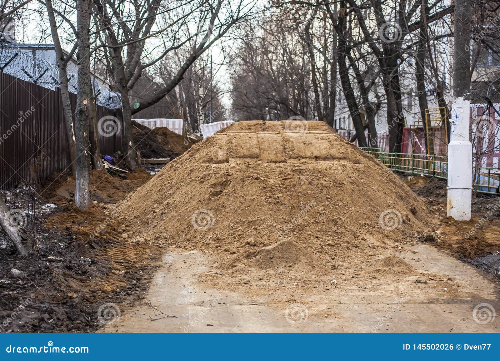 Big Pile of Sand on a Footpath. Workers Flooded the Passage Stock Photo ...