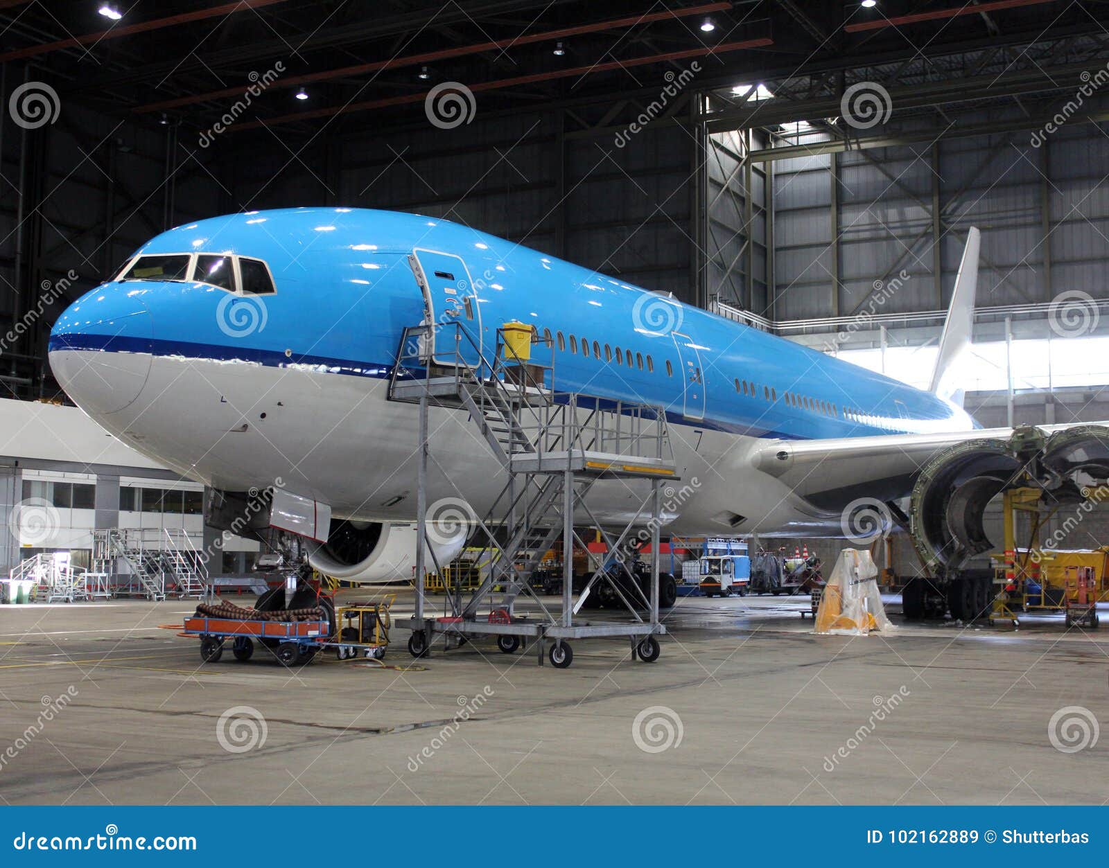 Big plane inside hangar stock image. Image of line, check - 102162889