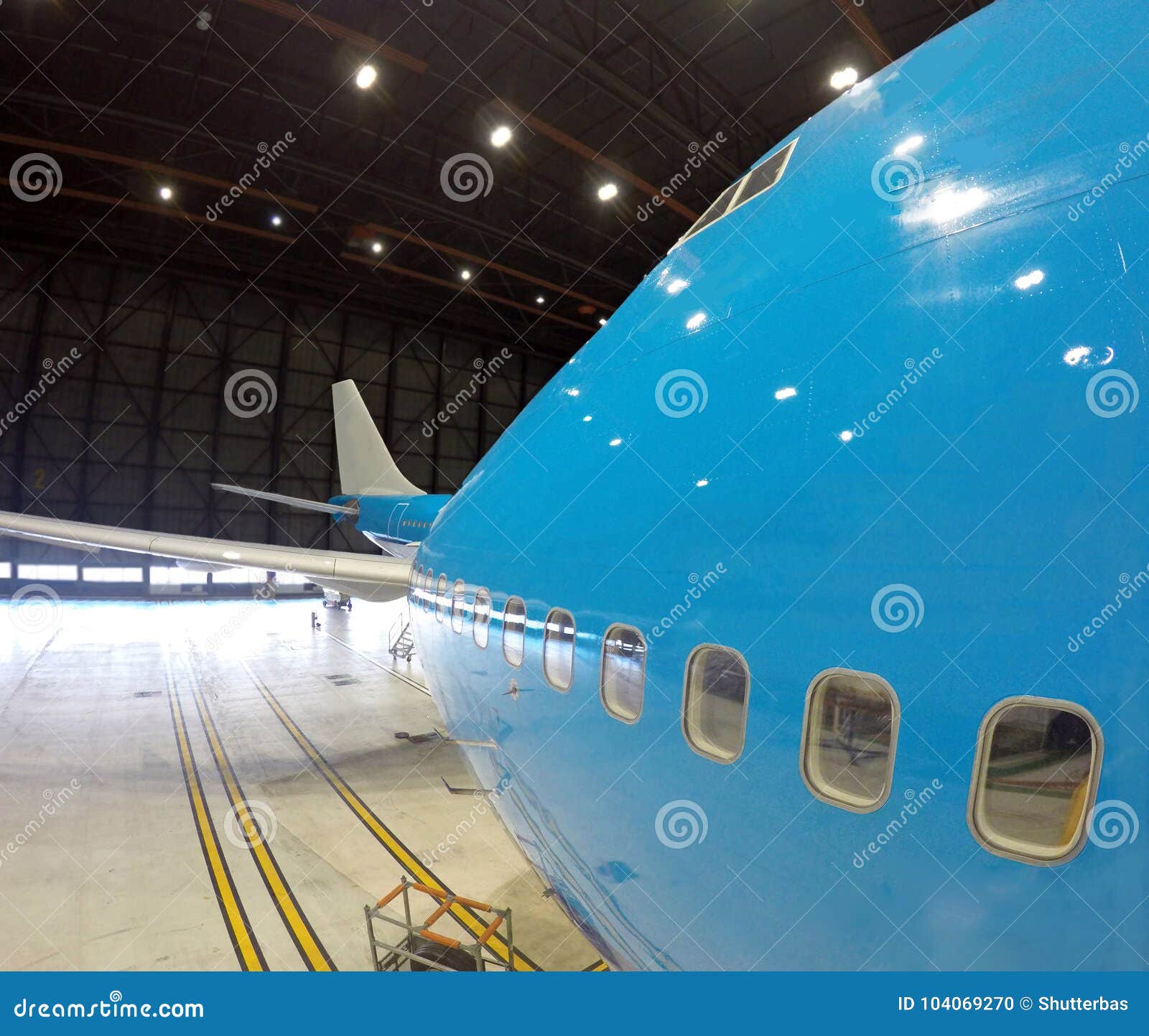 Big plane inside hangar stock photo. Image of delta - 104069270