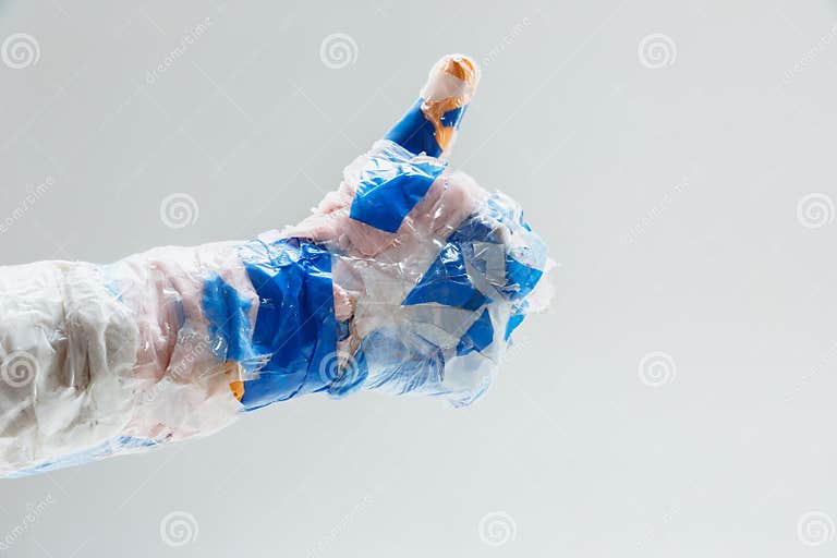 Big Plastic Hand Made of Garbage on White Studio Background Stock Image ...