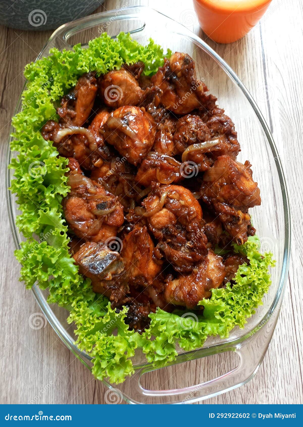 A Big Plate of Chicken Grilled with Letuce in the Side Stock Photo ...