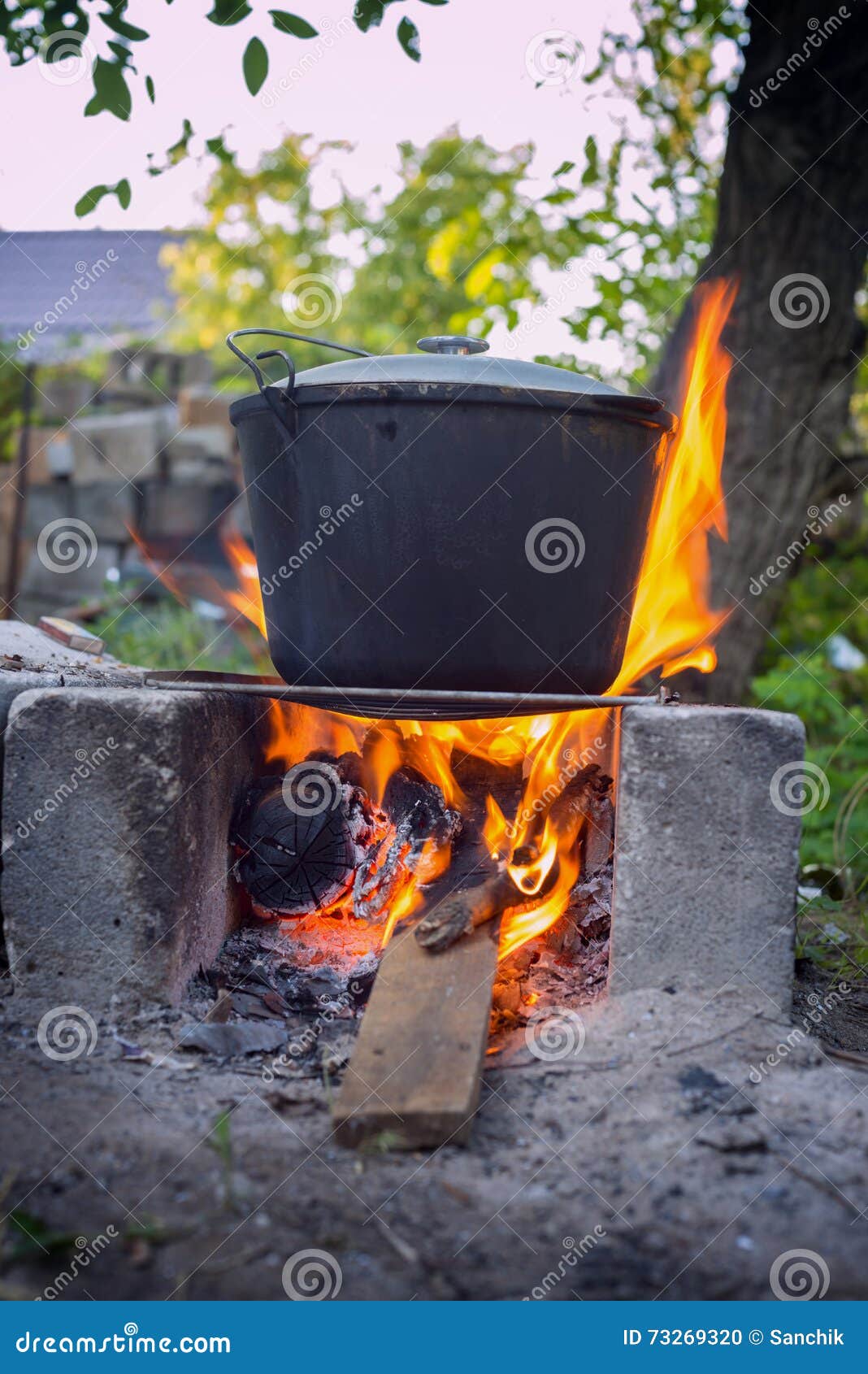 The big pot on the bonfire stock photo. Image of food - 73269320