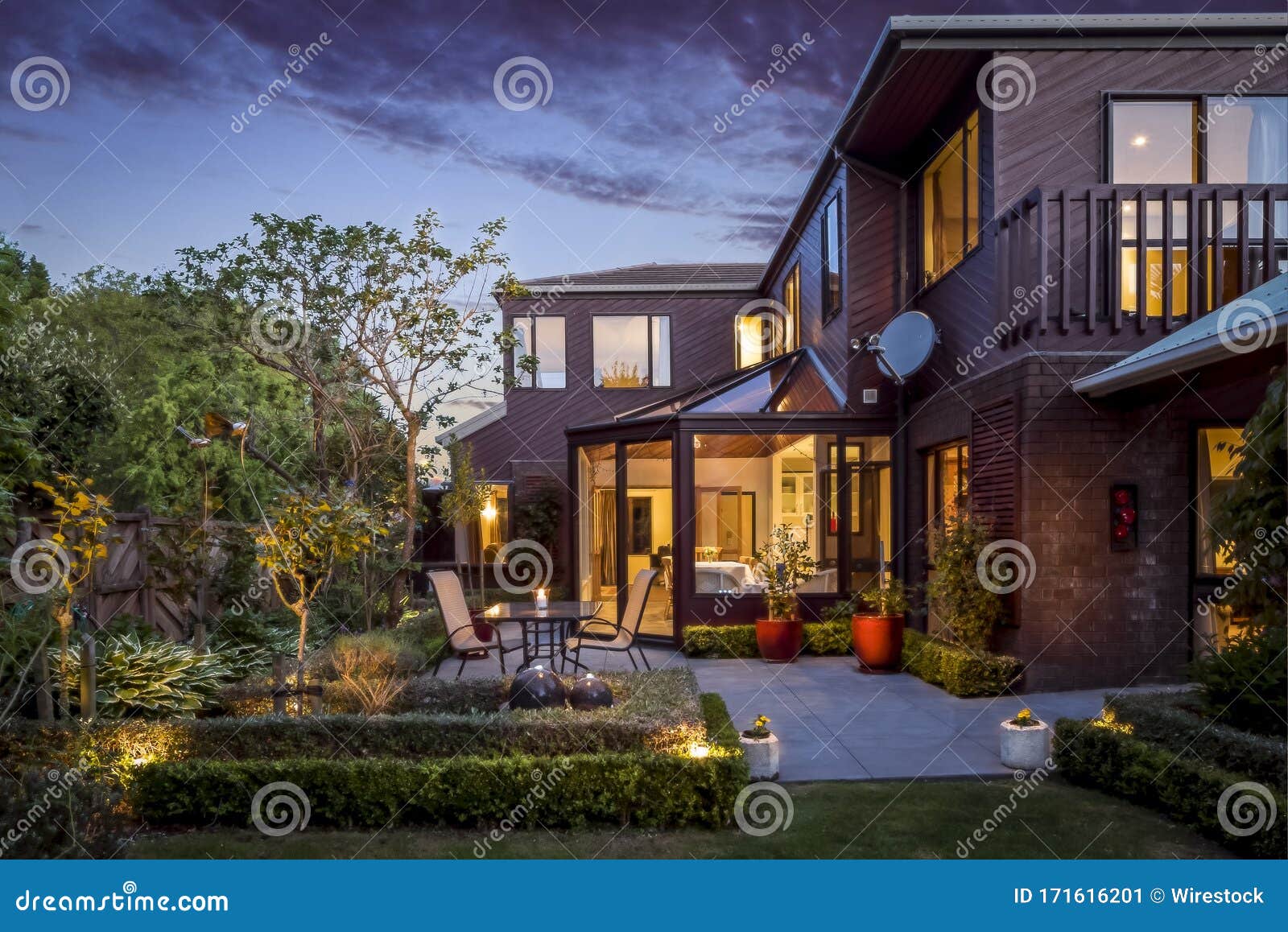 Big Private House with a Garden Under the Cloudy Sky at Night Stock ...