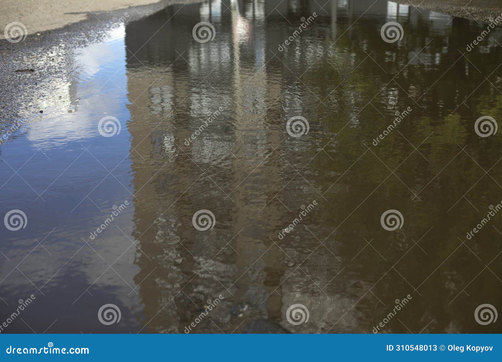 Big Puddle in City. Reflection of Building in Puddle Stock Image ...