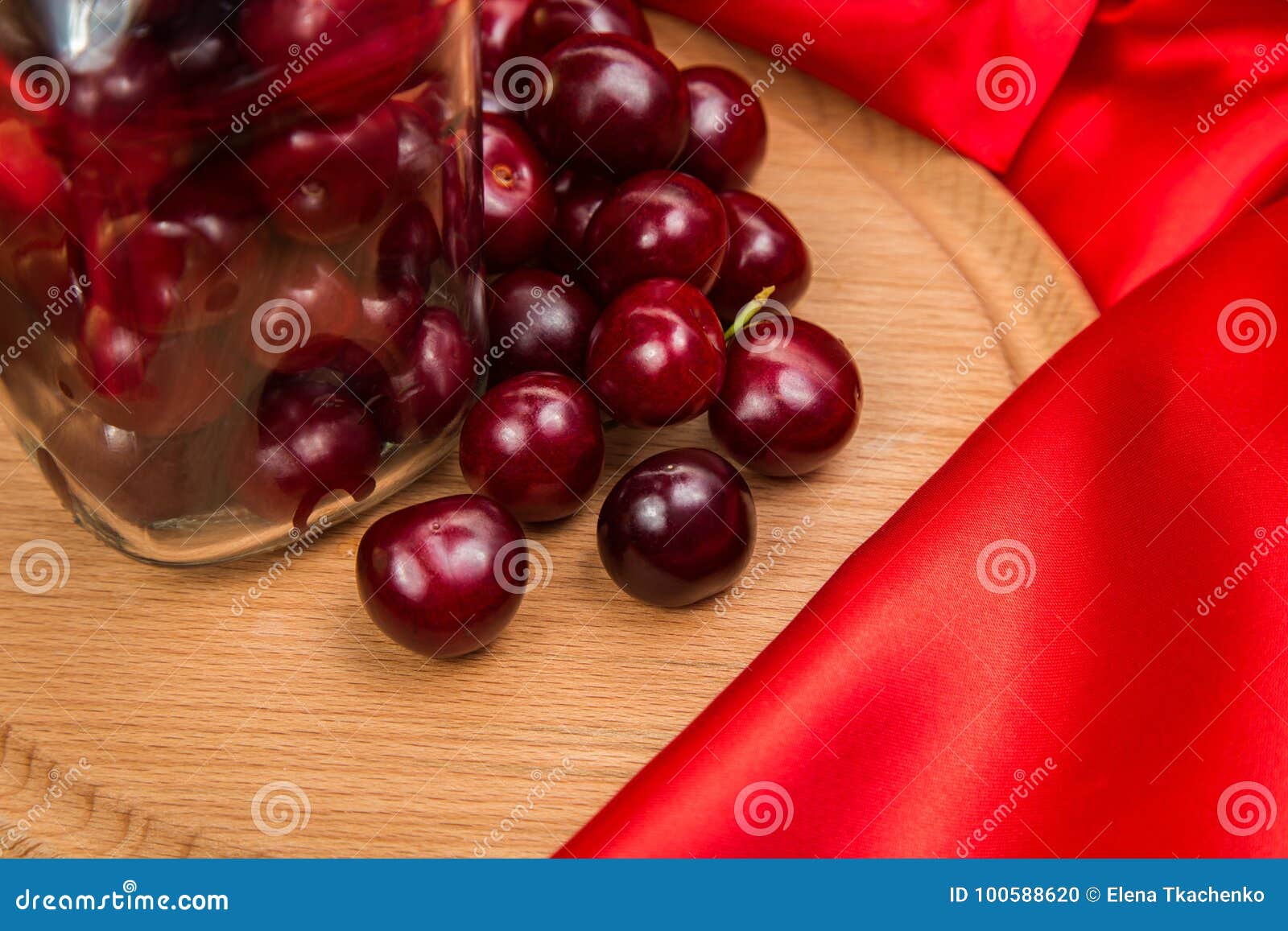 Big red cherry in a jar stock photo. Image of background - 100588620