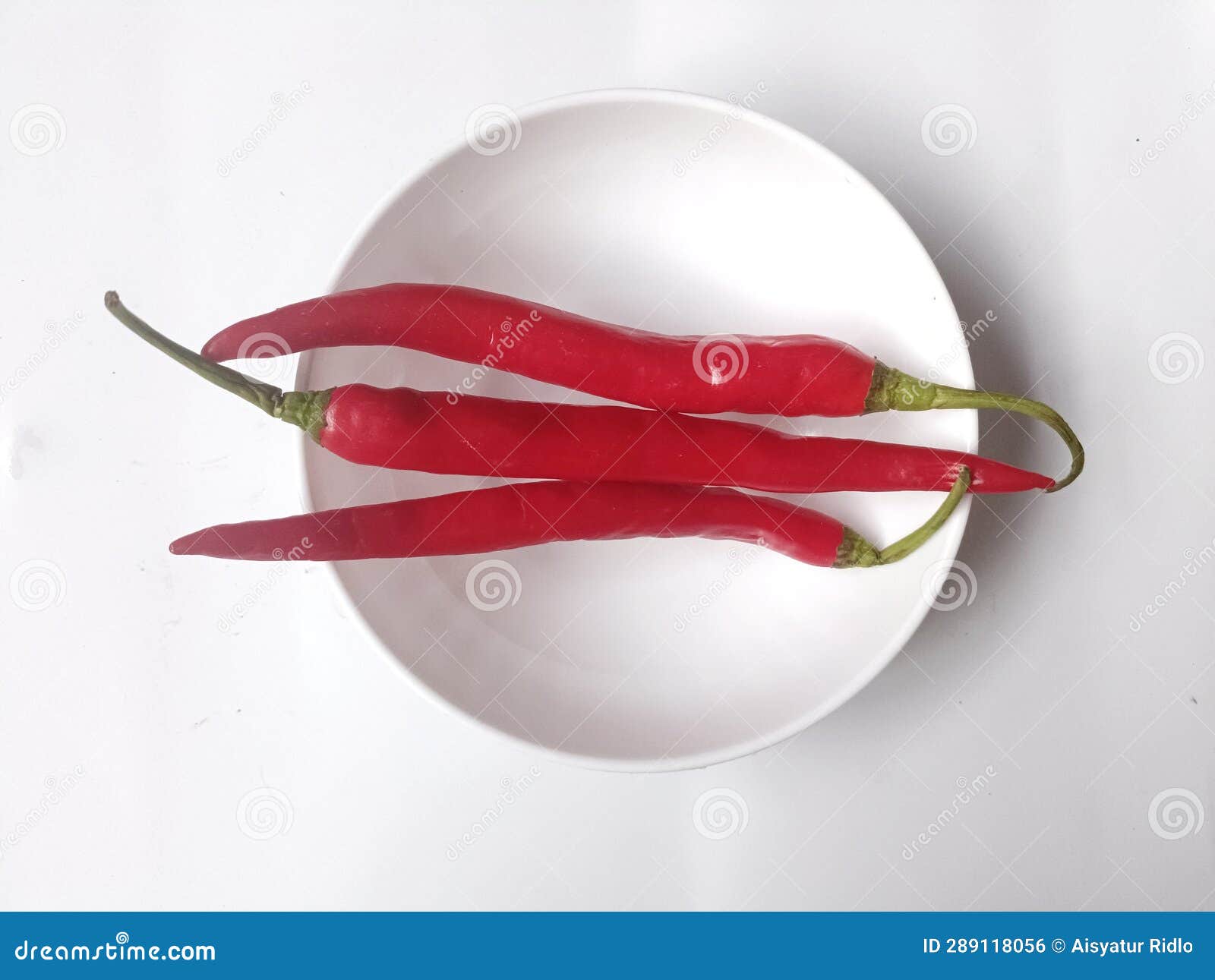 Big Red Chilli on the White Plate Isolated in White Stock Photo - Image ...