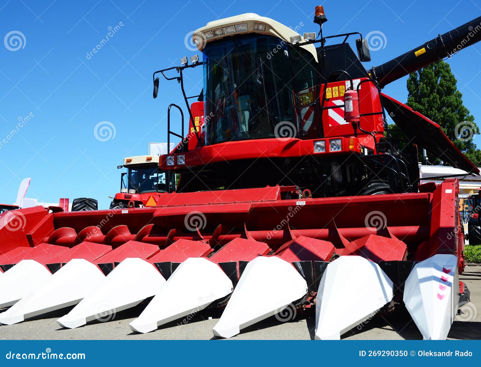 Big Red Combine Harvester Against Blue Sky Stock Photo - Image of ...