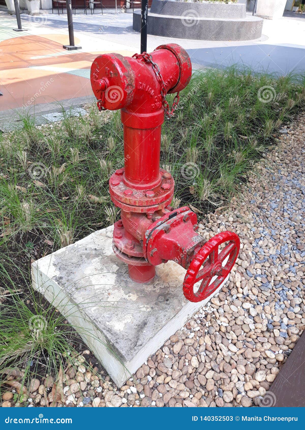 Big Red Fire Hydrant on Walk Street Stock Image - Image of valve, drain ...