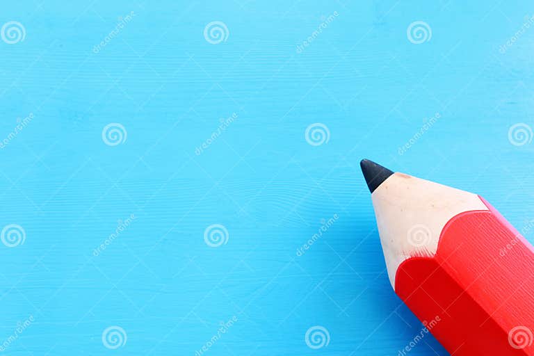 Big Red Pencil on Blue Background Stock Photo - Image of pencil, blue ...