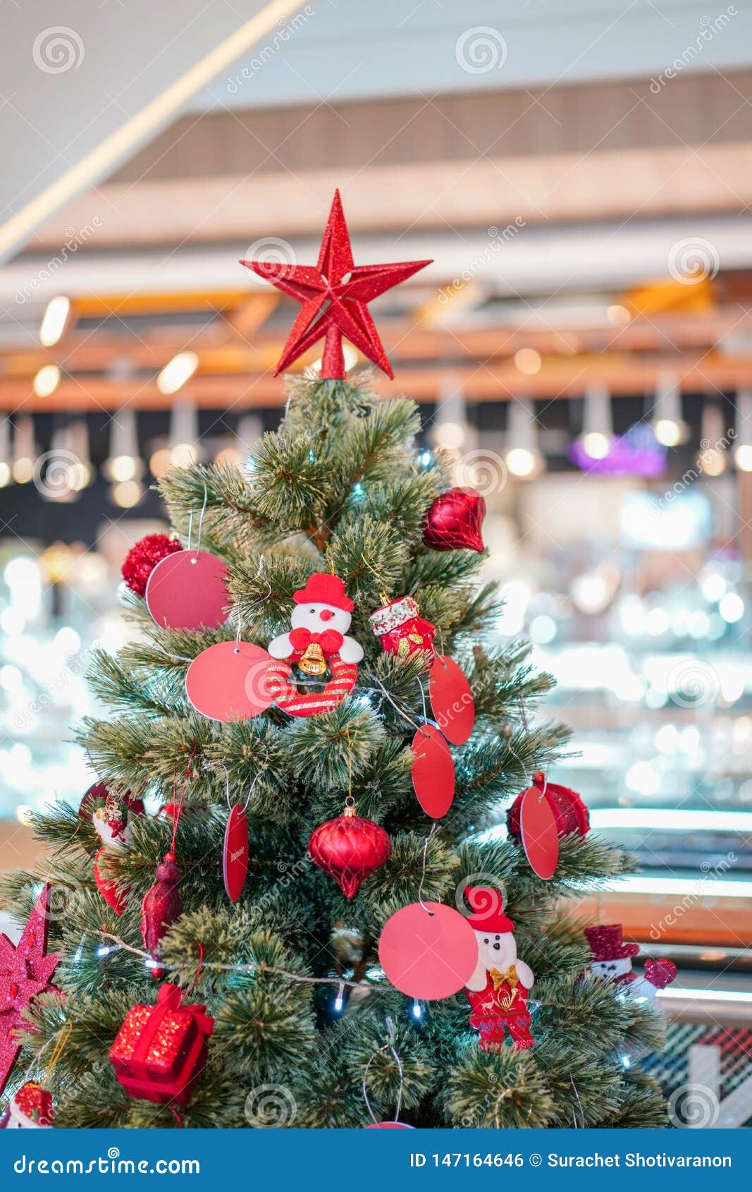 The Big Red Star Decoration Topped of the Christmas`s Tree Stock Photo ...