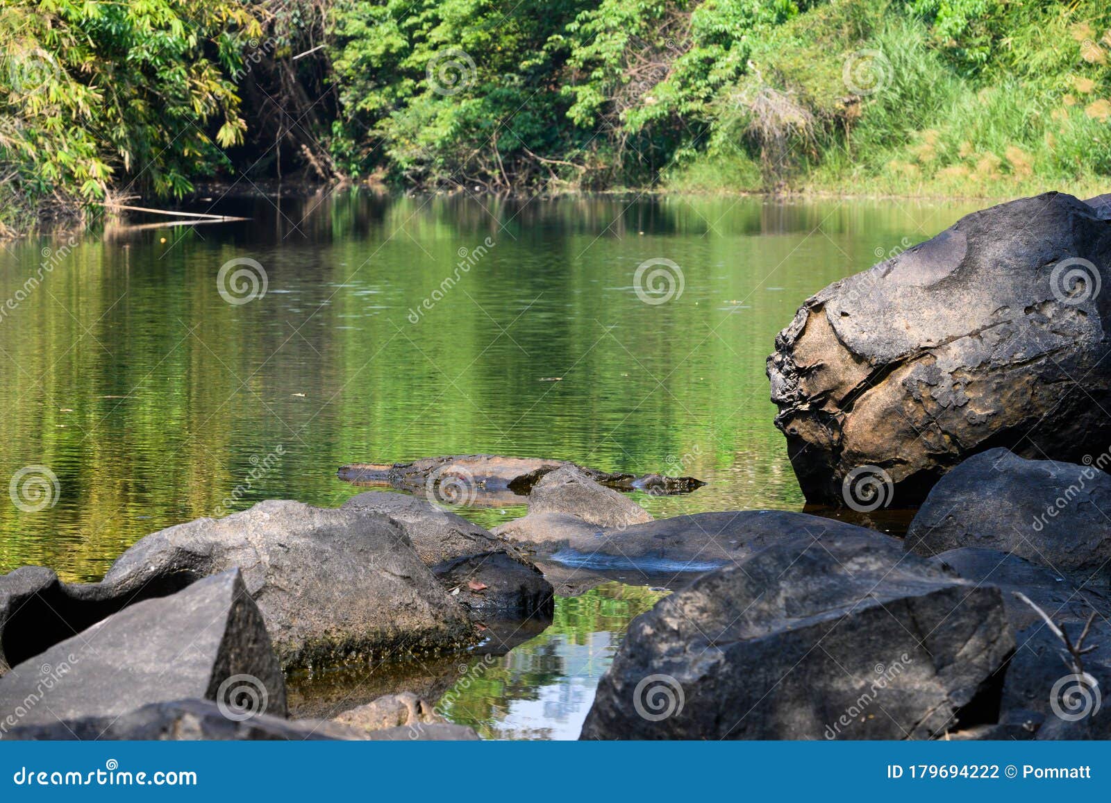 Big rock in river stock photo. Image of light, river - 179694222