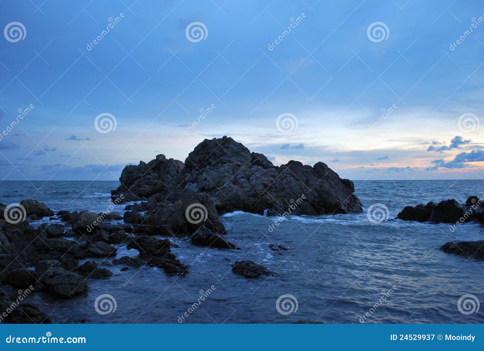 Big rock in the sea stock image. Image of reef, scene - 24529937
