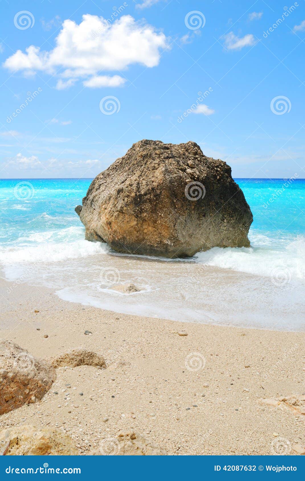 Big Rock on a Sunny Beach with Blue Sea and Sky Stock Photo - Image of ...