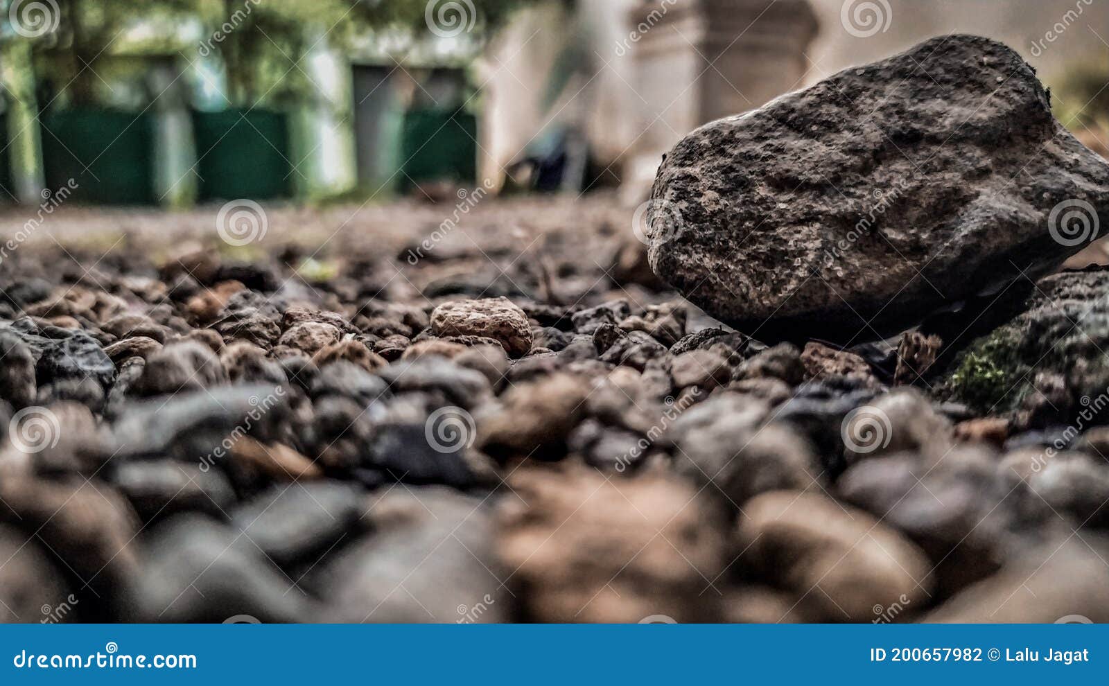 Big Rock Surrounded by Little Rock Stock Photo - Image of hard, black ...