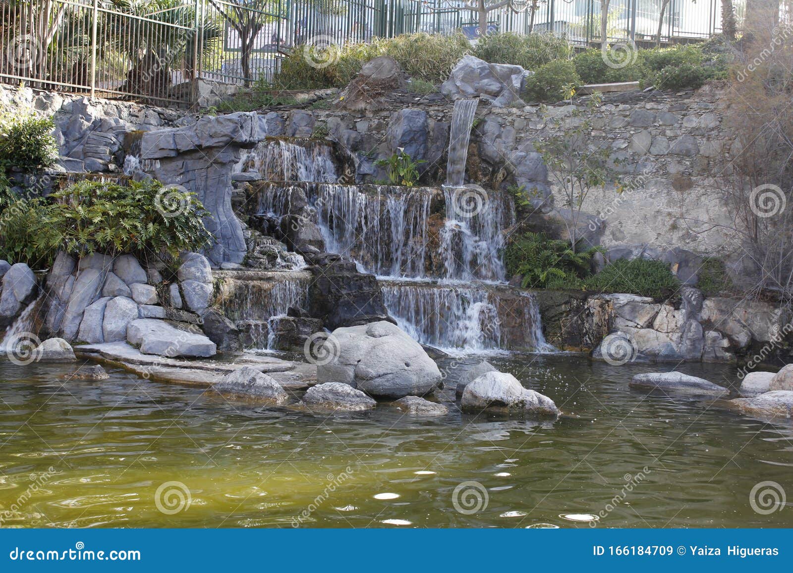 Big Rock Waterfall into Tropical Garden Stock Image - Image of tropical ...