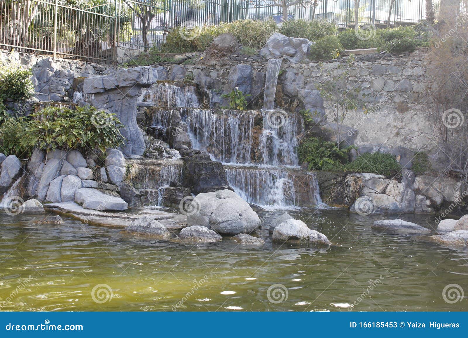 Big Rock Waterfall into Tropical Garden Stock Image - Image of travel ...