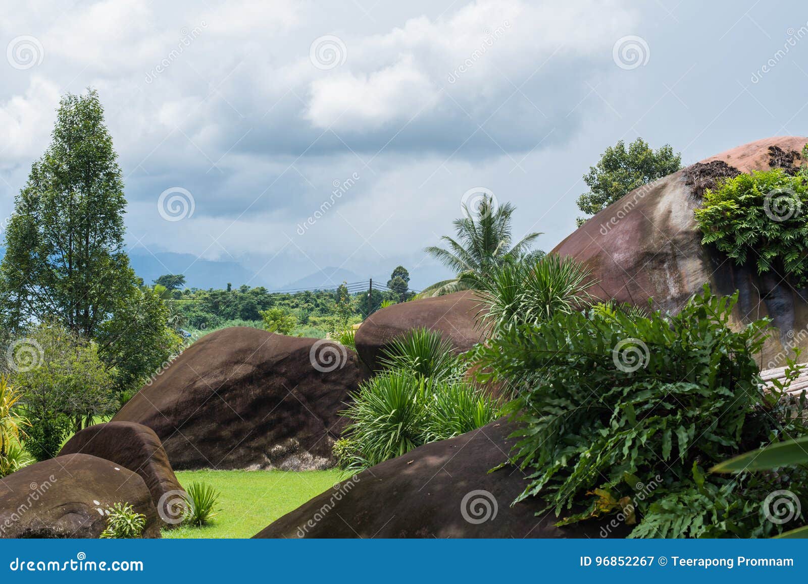 Big rocks and grass stock image. Image of cloud, rock - 96852267