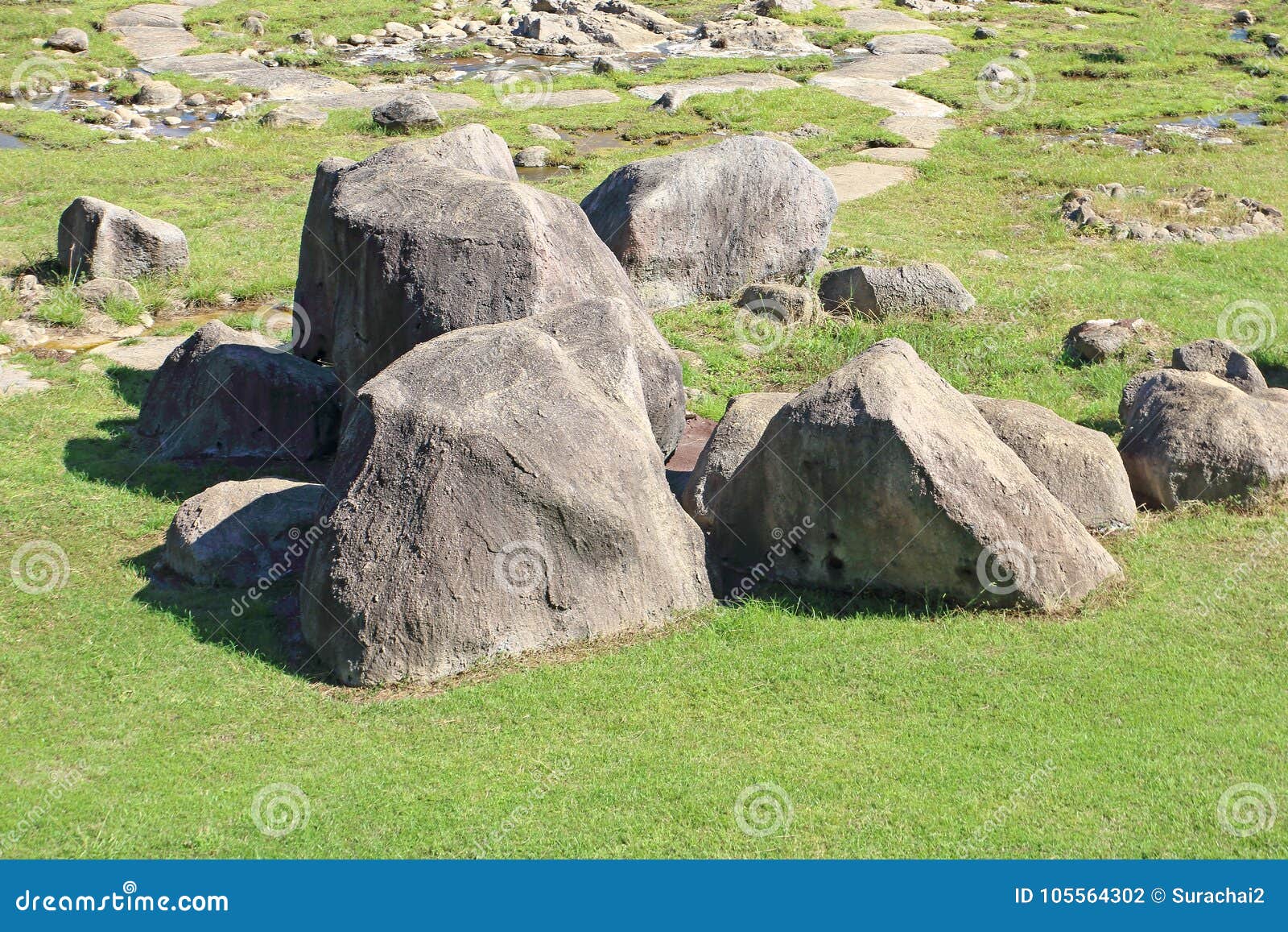 Big rocks in the lawn stock photo. Image of golf, field - 105564302