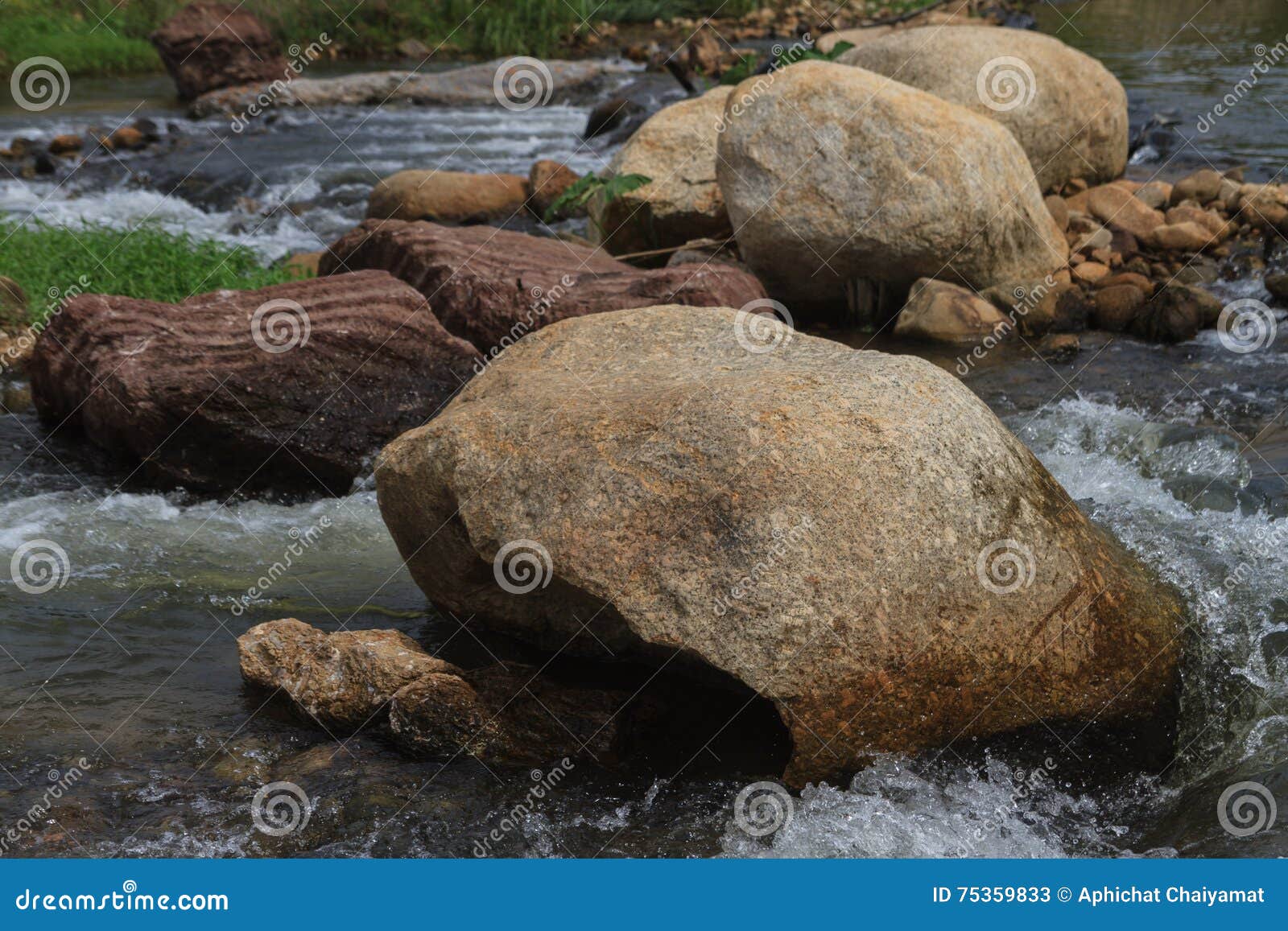 Big rocks in a rapid river stock image. Image of natural - 75359833