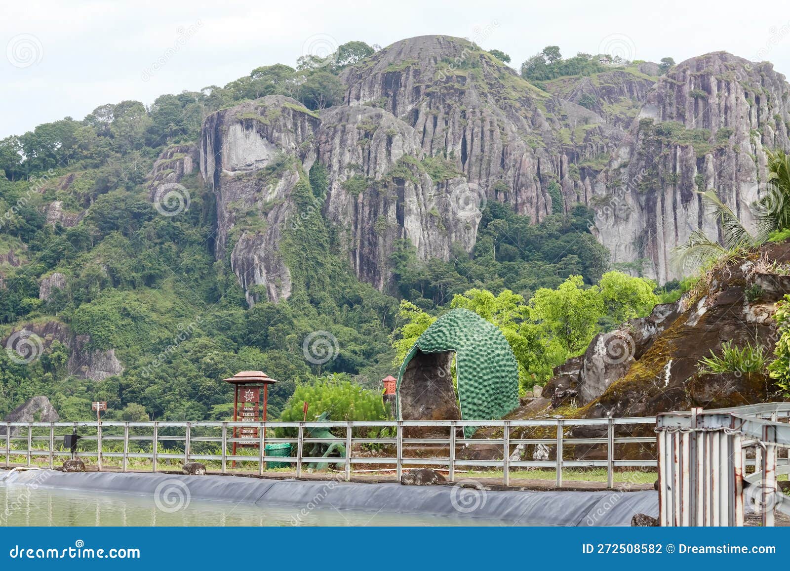 Big Rocky Green Hill Overgrown with Trees and Grass Stock Photo - Image ...