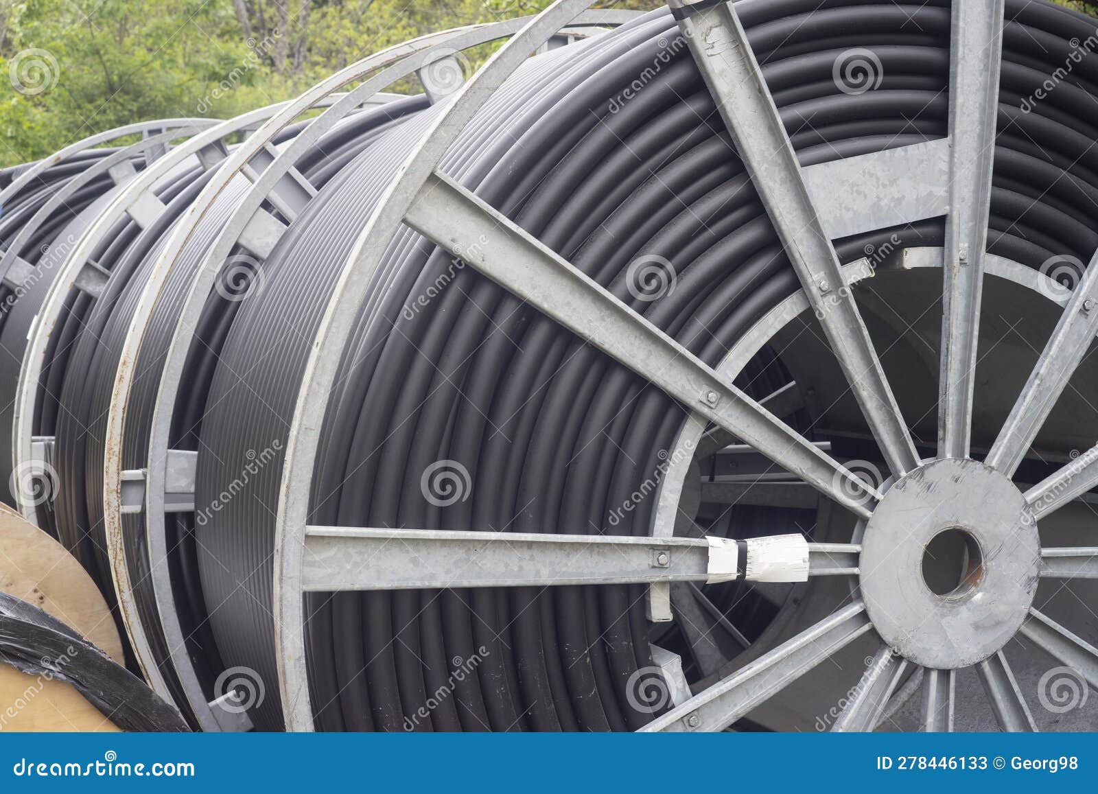 Big Rolls of Black Power Line Cable on Construction Site Stock Image ...