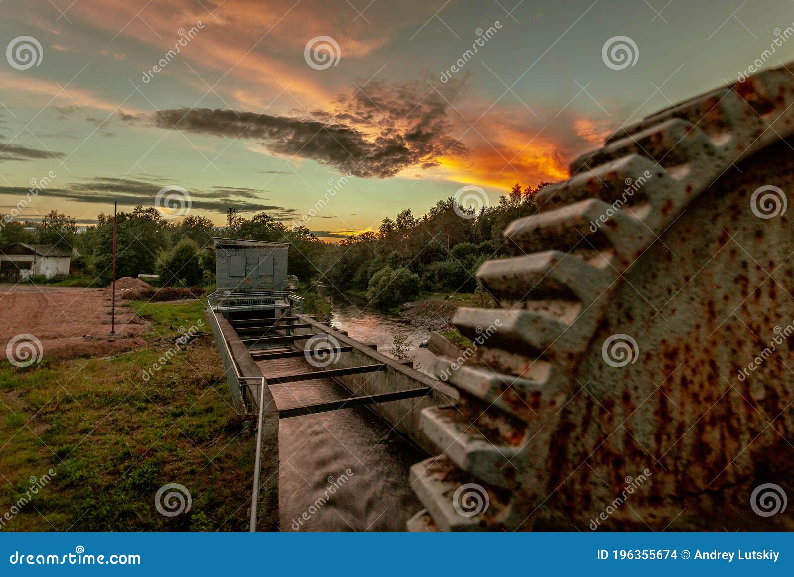 A Big Rusty Gear on the Levee. Stock Photo - Image of people, tourism ...