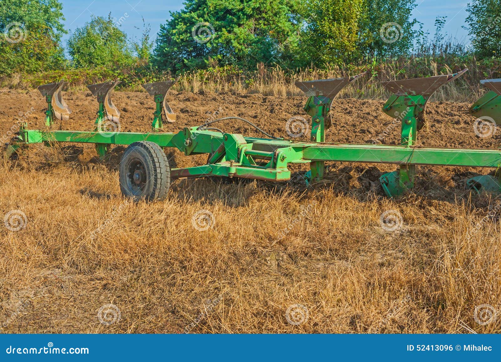 Big Set of Plough on Field in Work Agricultural Stock Photo - Image of ...