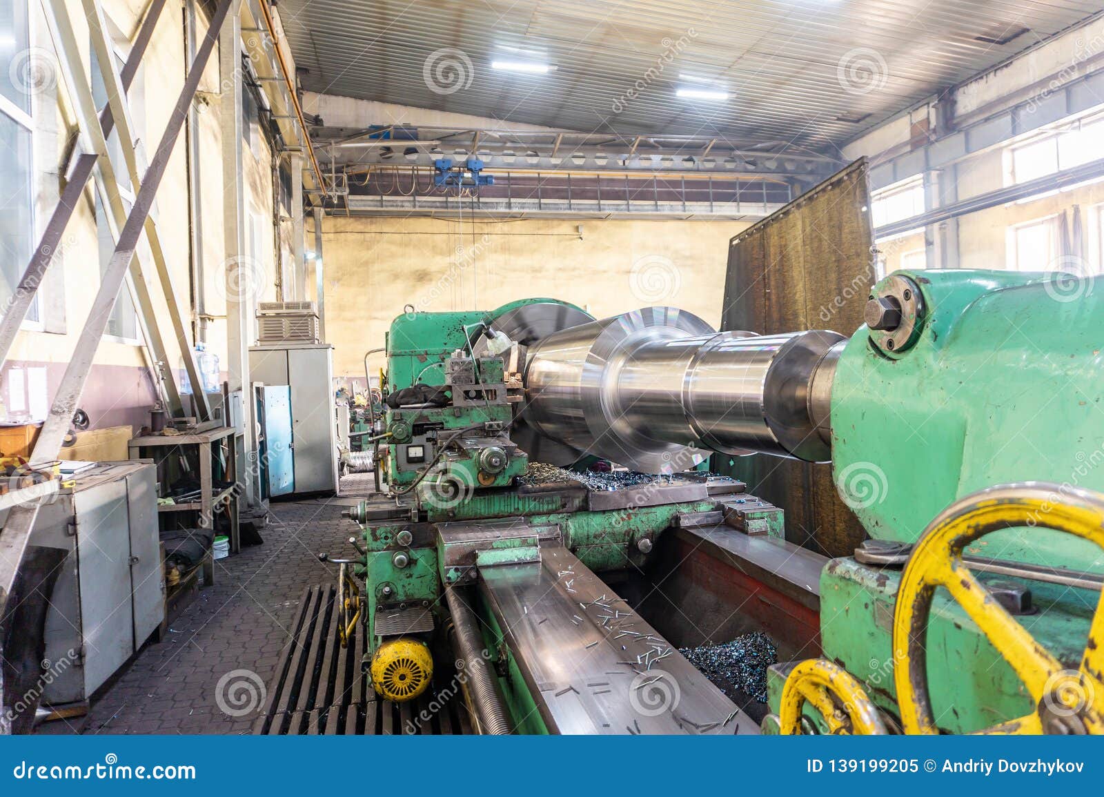The Big Shaft is Made on a Huge Lathe in the Workshop Stock Image ...