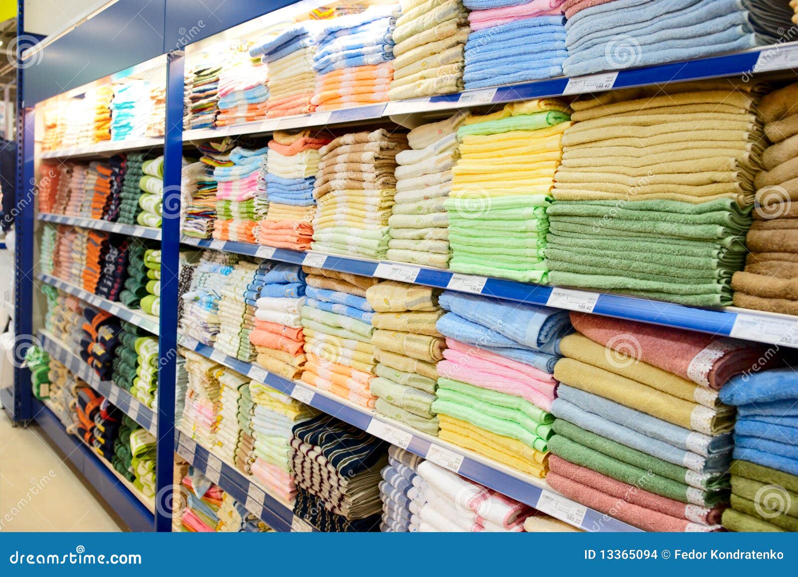 Big shelf with textiles stock photo. Image of choice - 13365094